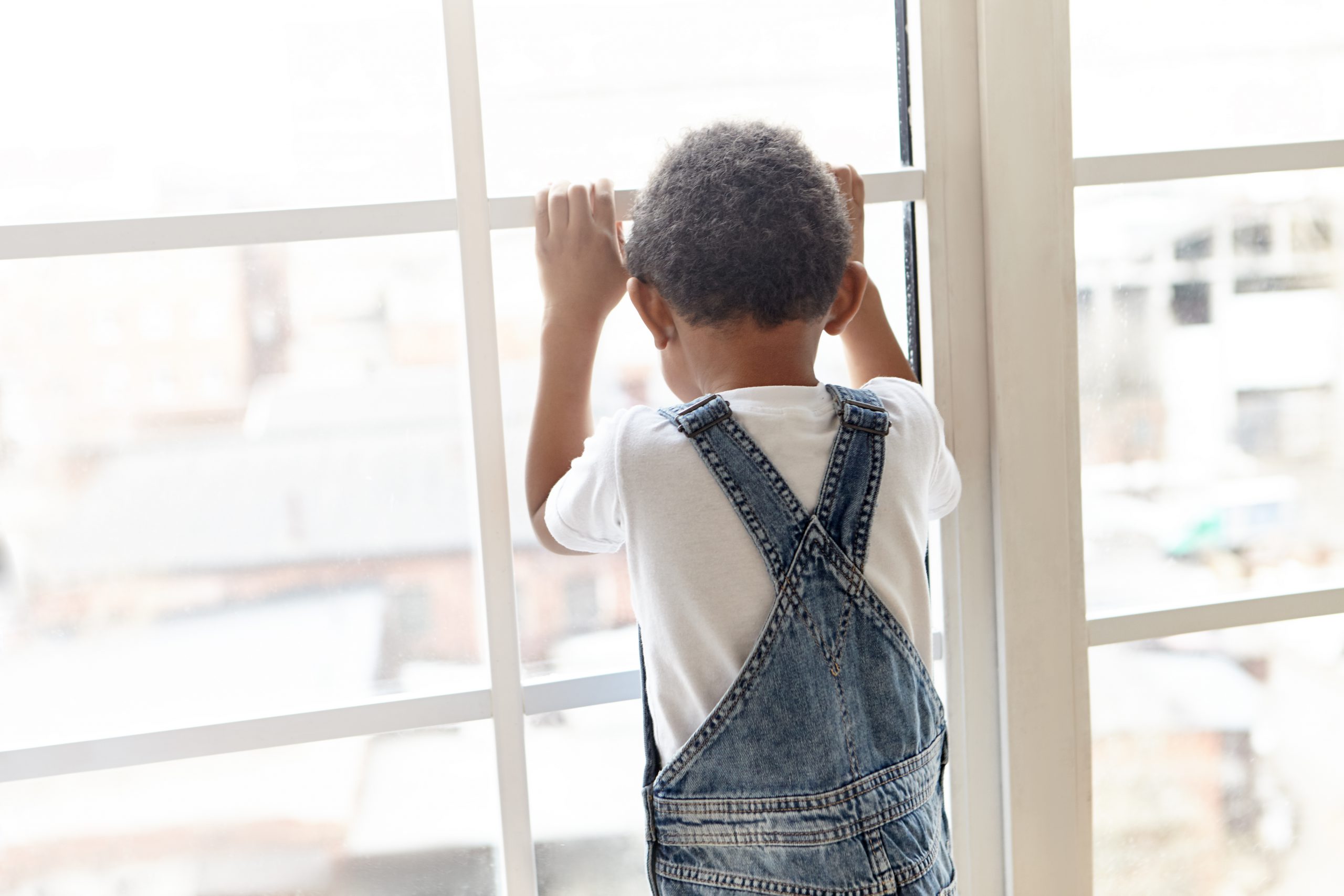 Back,Indoor,View,Of,African,American,Little,Boy,In,Stylish - Humanium