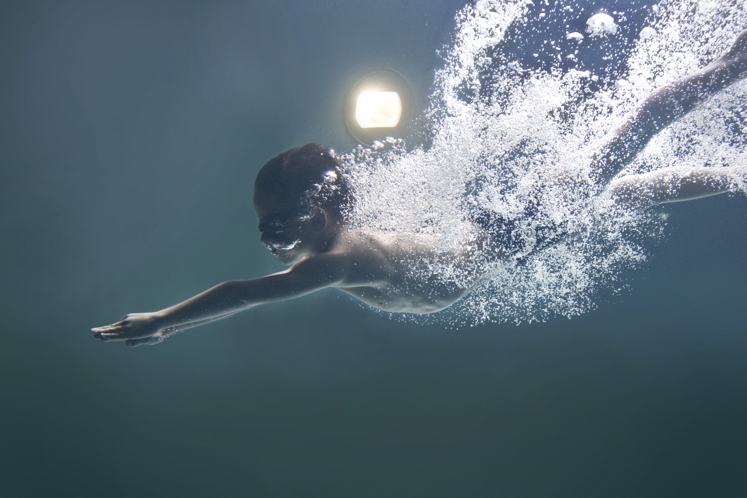 Isolated,Boy,After,Jump,Underwater - Humanium
